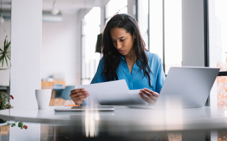 woman reading mail - CureHHT